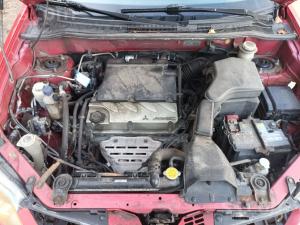Sarkans Mitsubishi Outlander 2006 Rīga, ar dzinēja tilpumu 2.40 L un nobraukumu 217 tūkst. km par 800 €, foto 6 vietnē AUTOMOTO.COM.LV