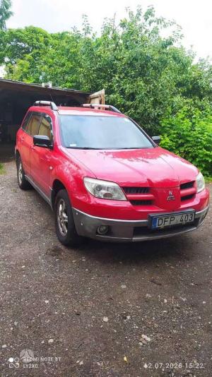Red Mitsubishi Outlander 2007 in Kaunas, with an engine capacity of 2.00 L and mileage of 195 thousand km for 699 €, photo  on AUTOMOTO.COM.LV