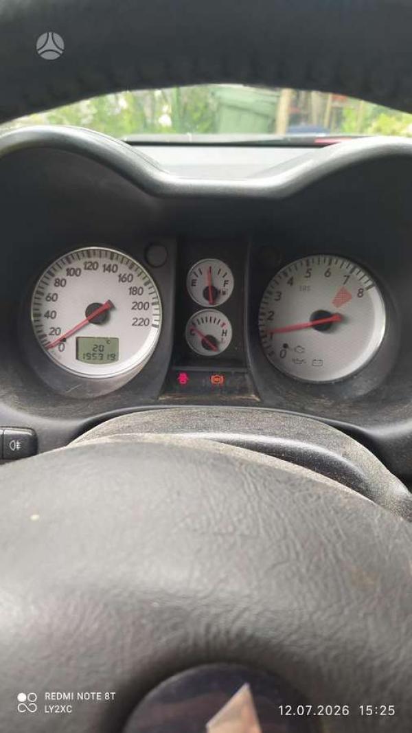 Red Mitsubishi Outlander 2007 in Kaunas, with an engine capacity of 2.00 L and mileage of 195 thousand km for 699 €, photo 5 on AUTOMOTO.COM.LV