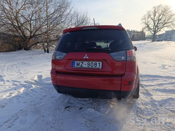 Red Mitsubishi Outlander 2008 in Riga, with an engine capacity of 2.40 L and mileage of 304 thousand km for 2450 €, photo 2 on AUTOMOTO.COM.LV