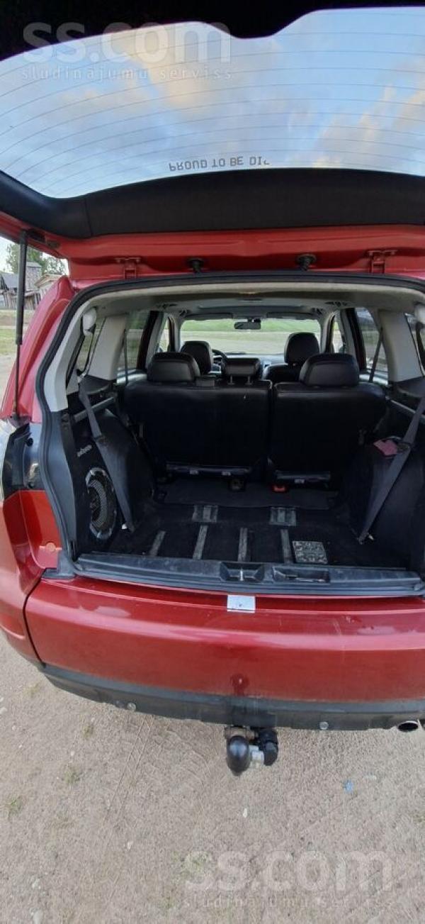 Red Mitsubishi Outlander 2008 in Rezekne, with an engine capacity of 2.20 L and mileage of 334 thousand km for 2900 €, photo 7 on AUTOMOTO.COM.LV