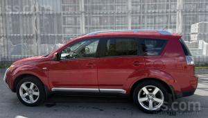 Red Mitsubishi Outlander 2008 in Riga, with an engine capacity of 2.40 L and mileage of 105 thousand km for 4990 €, photo  on AUTOMOTO.COM.LV