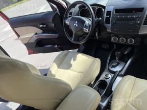 Red Mitsubishi Outlander 2008 in Riga, with an engine capacity of 2.40 L and mileage of 105 thousand km for 4990 €, photo 9 on AUTOMOTO.COM.LV