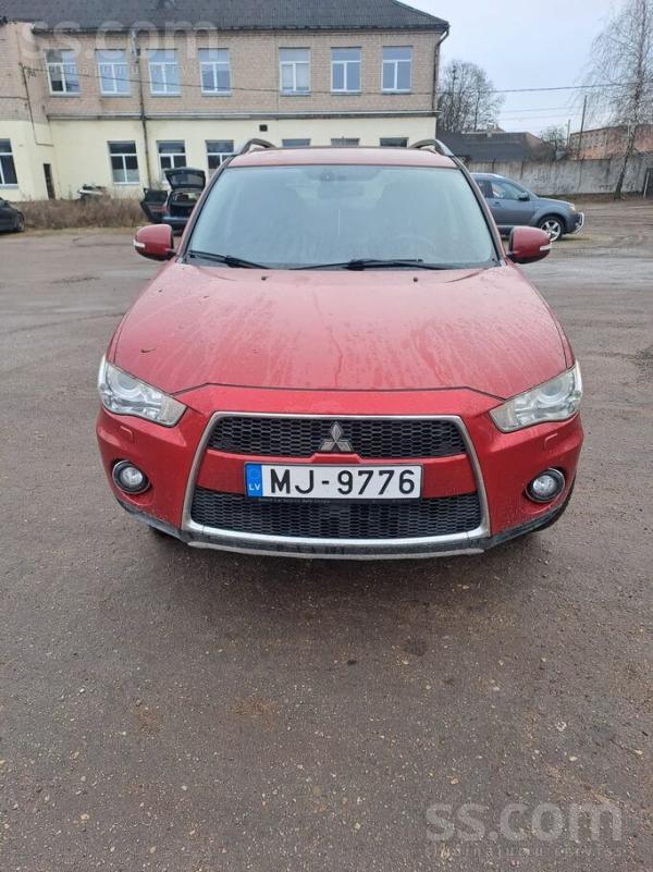 Sarkans Mitsubishi Outlander 2010 Daugavpils, ar dzinēja tilpumu 2.20 L un nobraukumu 245 tūkst. km par 3650 €, foto 1 vietnē AUTOMOTO.COM.LV