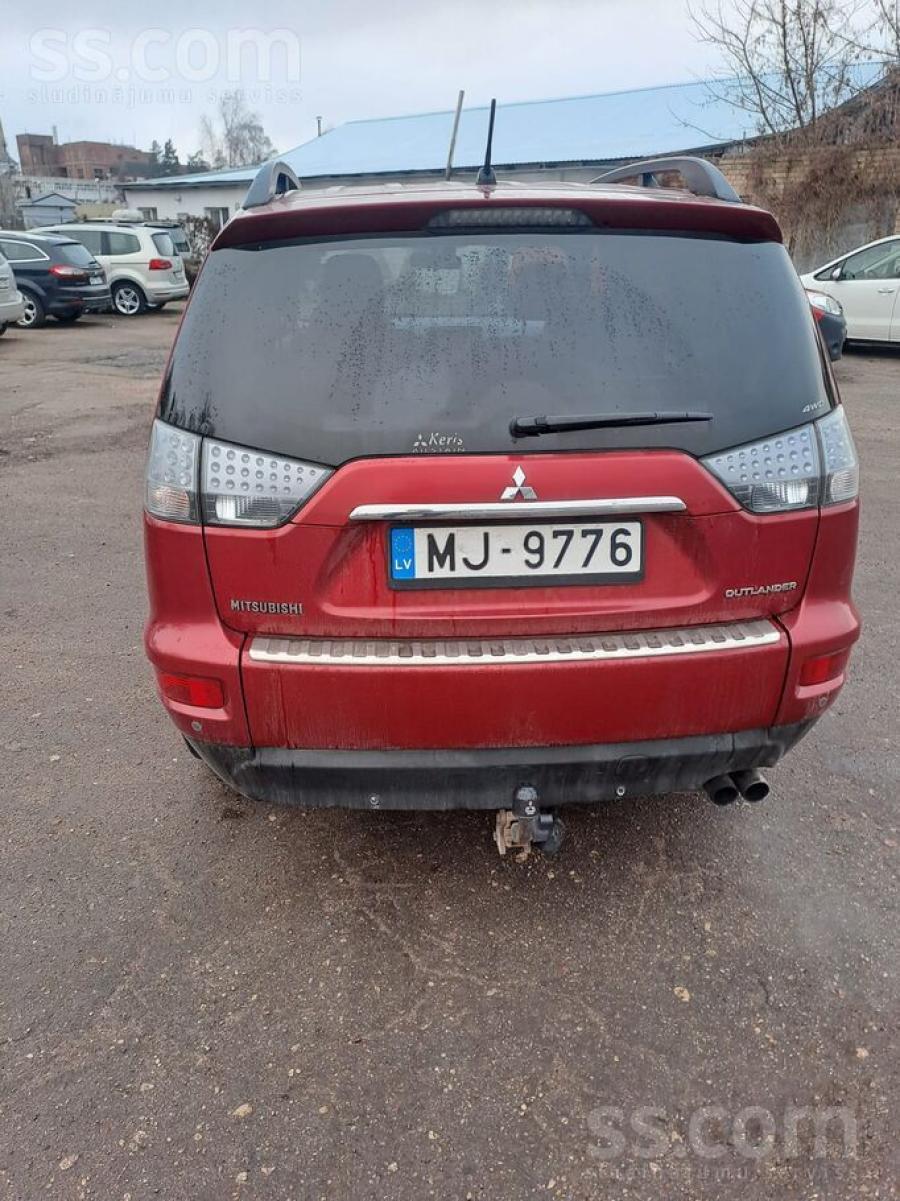 Sarkans Mitsubishi Outlander 2010 Daugavpils, ar dzinēja tilpumu 2.20 L un nobraukumu 245 tūkst. km par 3650 €, foto 2 vietnē AUTOMOTO.COM.LV