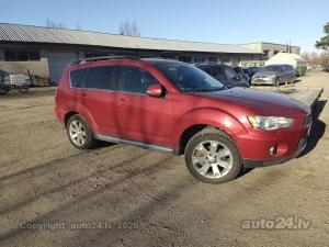 Sarkans Mitsubishi Outlander 2011 Tallina, ar dzinēja tilpumu 2.20 L un nobraukumu 329 tūkst. km par 6500 €, foto  vietnē AUTOMOTO.COM.LV