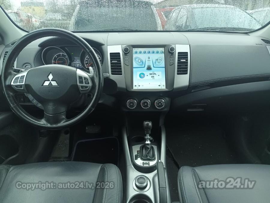 Sarkans Mitsubishi Outlander 2011 Tallina, ar dzinēja tilpumu 2.20 L un nobraukumu 329 tūkst. km par 6500 €, foto 5 vietnē AUTOMOTO.COM.LV