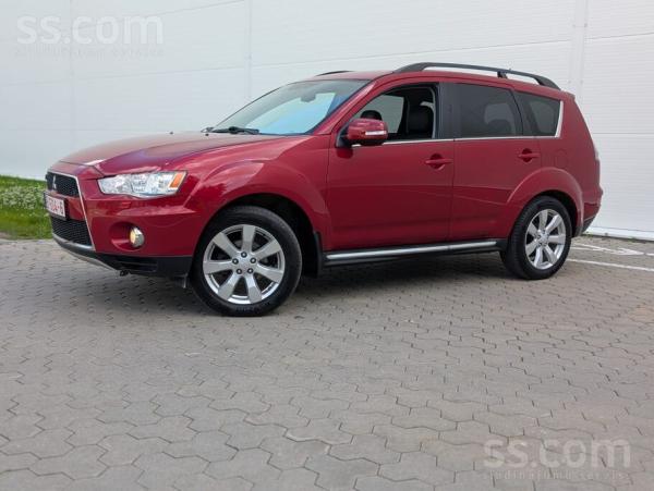Sarkans Mitsubishi Outlander 2012 Rīga, ar dzinēja tilpumu 2.20 L un nobraukumu 269 tūkst. km par 6900 €, foto 2 vietnē AUTOMOTO.COM.LV