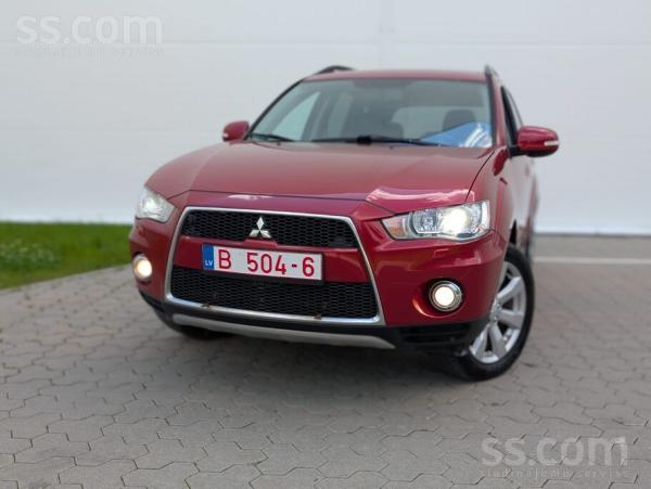 Sarkans Mitsubishi Outlander 2012 Rīga, ar dzinēja tilpumu 2.20 L un nobraukumu 269 tūkst. km par 6900 €, foto 3 vietnē AUTOMOTO.COM.LV