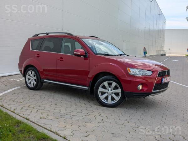 Sarkans Mitsubishi Outlander 2012 Rīga, ar dzinēja tilpumu 2.20 L un nobraukumu 269 tūkst. km par 6900 €, foto 6 vietnē AUTOMOTO.COM.LV