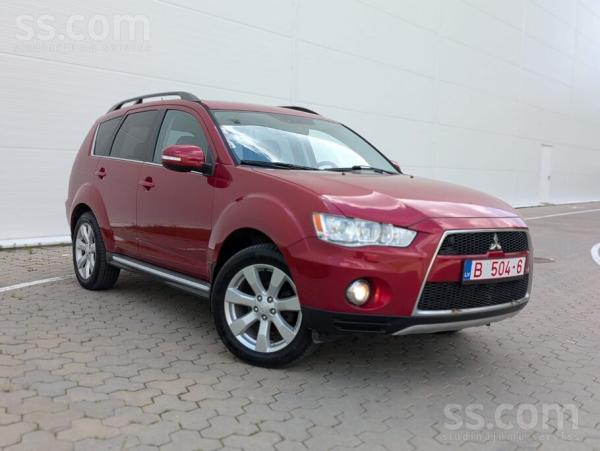 Sarkans Mitsubishi Outlander 2012 Rīga, ar dzinēja tilpumu 2.20 L un nobraukumu 269 tūkst. km par 6900 €, foto 7 vietnē AUTOMOTO.COM.LV