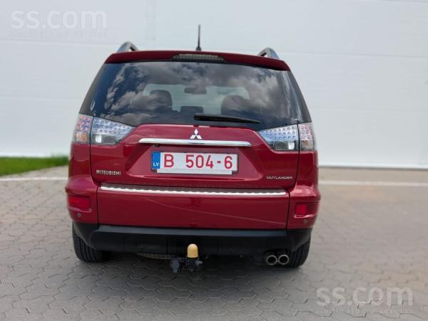 Sarkans Mitsubishi Outlander 2012 Rīga, ar dzinēja tilpumu 2.20 L un nobraukumu 269 tūkst. km par 6900 €, foto 8 vietnē AUTOMOTO.COM.LV