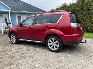 Red Mitsubishi Outlander 2012 in Riga, with an engine capacity of 2.20 L and mileage of 288 thousand km for 5250 €, photo 6 on AUTOMOTO.COM.LV
