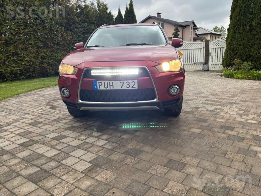Red Mitsubishi Outlander 2012 in Riga, with an engine capacity of 2.20 L and mileage of 288 thousand km for 5250 €, photo 7 on AUTOMOTO.COM.LV