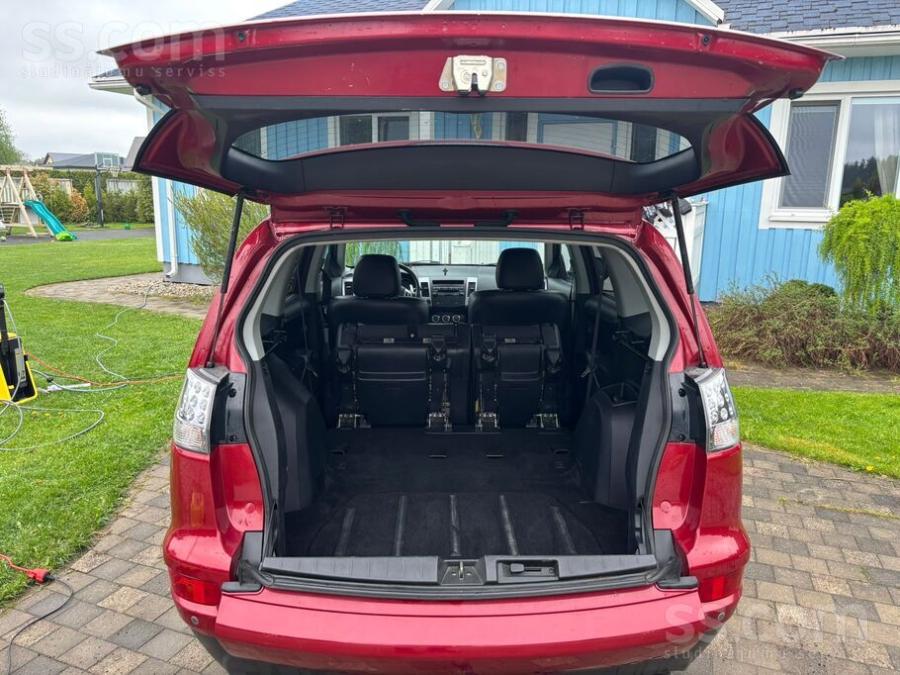 Red Mitsubishi Outlander 2012 in Riga, with an engine capacity of 2.20 L and mileage of 288 thousand km for 5250 €, photo 8 on AUTOMOTO.COM.LV