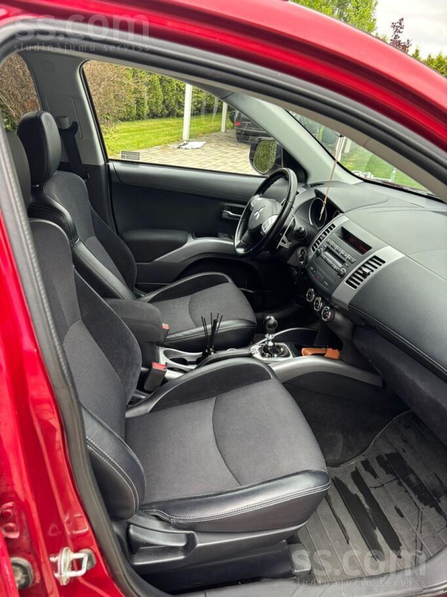 Red Mitsubishi Outlander 2012 in Riga, with an engine capacity of 2.20 L and mileage of 288 thousand km for 5250 €, photo 9 on AUTOMOTO.COM.LV