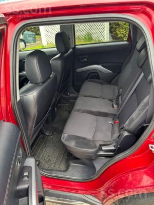 Red Mitsubishi Outlander 2012 in Riga, with an engine capacity of 2.20 L and mileage of 288 thousand km for 5250 €, photo 12 on AUTOMOTO.COM.LV