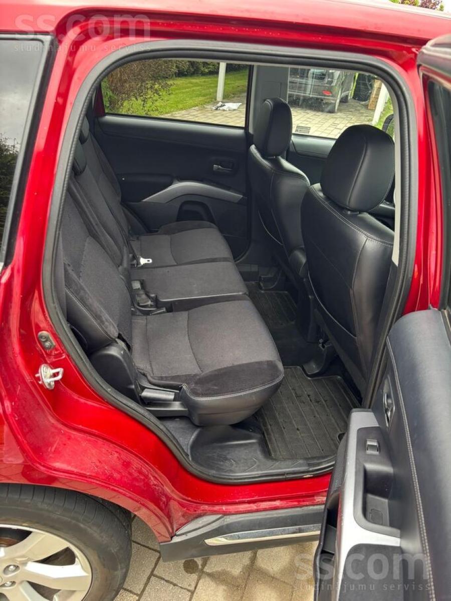 Red Mitsubishi Outlander 2012 in Riga, with an engine capacity of 2.20 L and mileage of 288 thousand km for 5250 €, photo 13 on AUTOMOTO.COM.LV