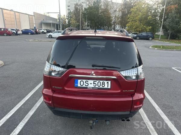 Red Mitsubishi Outlander 2012 in Riga, with an engine capacity of 2.20 L and mileage of 290 thousand km for 5450 €, photo 7 on AUTOMOTO.COM.LV
