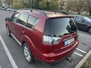 Red Mitsubishi Outlander 2012 in Riga, with an engine capacity of 2.20 L and mileage of 290 thousand km for 5450 €, photo 8 on AUTOMOTO.COM.LV