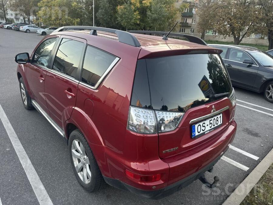 Red Mitsubishi Outlander 2012 in Riga, with an engine capacity of 2.20 L and mileage of 290 thousand km for 5450 €, photo 8 on AUTOMOTO.COM.LV