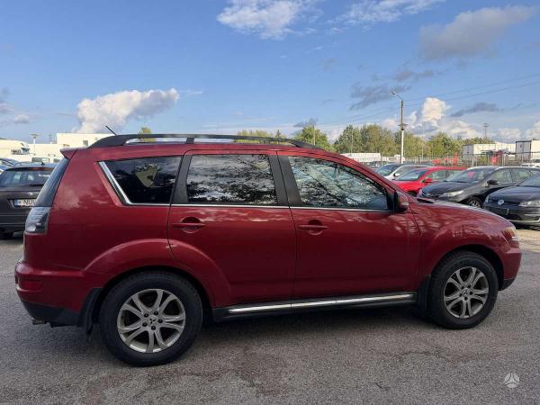Sarkans Mitsubishi Outlander 2012 Marijampole, ar dzinēja tilpumu 2.18 L un nobraukumu 208 tūkst. km par 3450 €, foto 4 vietnē AUTOMOTO.COM.LV