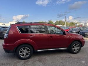 Sarkans Mitsubishi Outlander 2012 Marijampole, ar dzinēja tilpumu 2.18 L un nobraukumu 208 tūkst. km par 3450 €, foto 5 vietnē AUTOMOTO.COM.LV