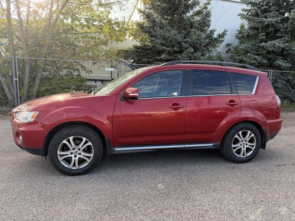 Sarkans Mitsubishi Outlander 2012 Marijampole, ar dzinēja tilpumu 2.18 L un nobraukumu 208 tūkst. km par 3450 €, foto 8 vietnē AUTOMOTO.COM.LV