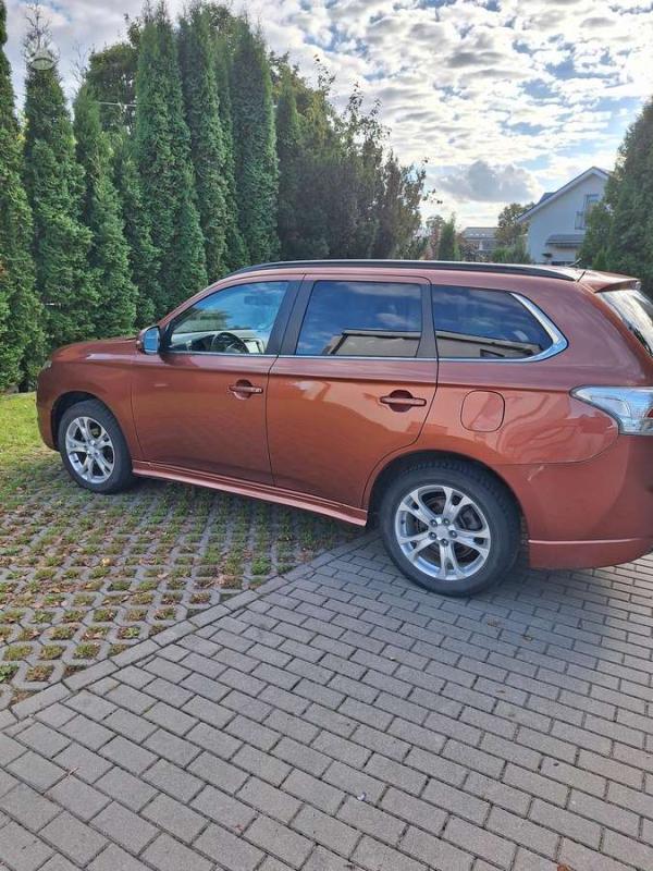 Sarkans Mitsubishi Outlander 2012 Utena, ar dzinēja tilpumu 2.30 L un nobraukumu 203 tūkst. km par 5500 €, foto 6 vietnē AUTOMOTO.COM.LV