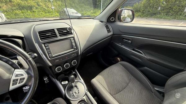 Red Mitsubishi Outlander 2013 in Kaunas, with an engine capacity of 2.00 L and mileage of 130 thousand km for 7200 €, photo 9 on AUTOMOTO.COM.LV