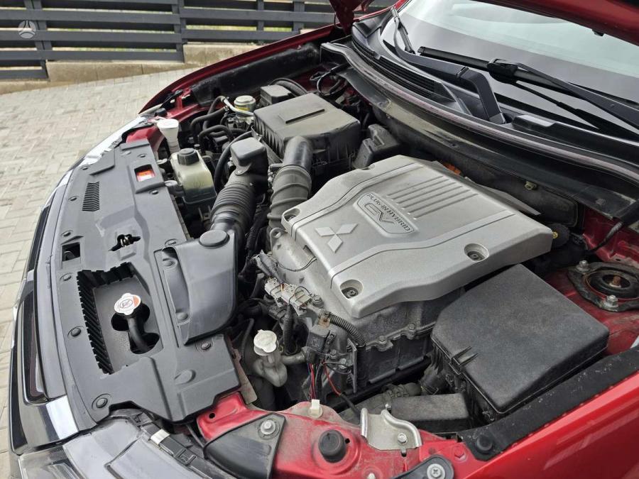 Red Mitsubishi Outlander 2017 in Telschi, with an engine capacity of 2.00 L and mileage of 266 thousand km for 10999 €, photo 52 on AUTOMOTO.COM.LV