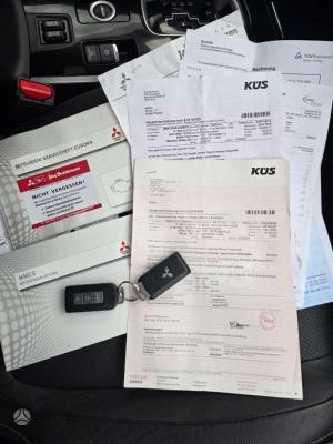 Sarkans Mitsubishi Outlander 2018 Marijampole, ar dzinēja tilpumu 2.27 L un nobraukumu 214 tūkst. km par 12250 €, foto 34 vietnē AUTOMOTO.COM.LV