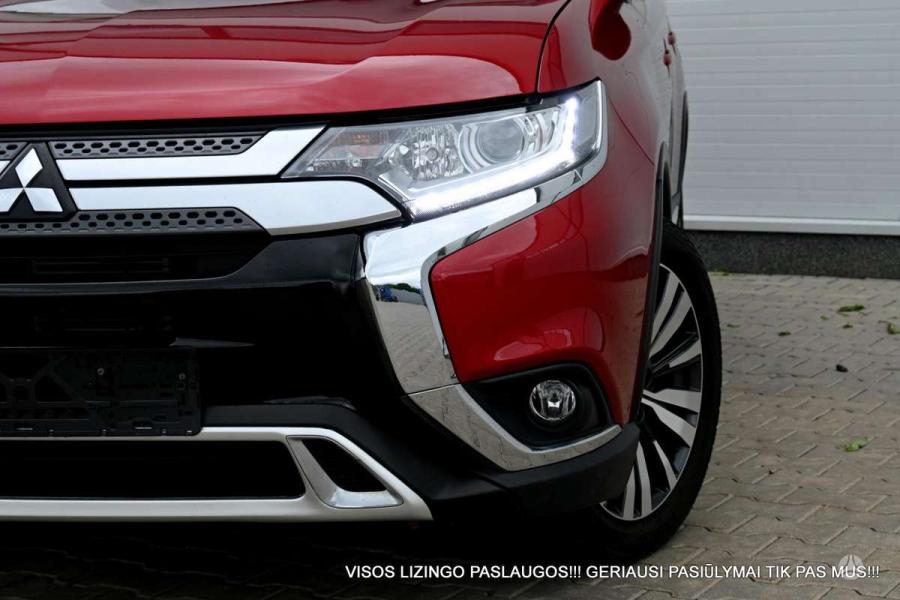 Red Mitsubishi Outlander 2019 in Kretinga, with an engine capacity of 2.36 L and mileage of 111 thousand km for 11099 €, photo 6 on AUTOMOTO.COM.LV