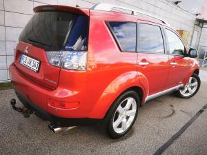 Red Mitsubishi Outlander 2009 in Klaipeda, with an engine capacity of 2.20 L and mileage of 216 thousand km for 4190 €, photo 7 on AUTOMOTO.COM.LV