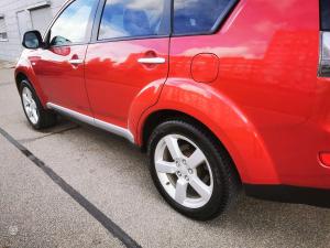 Red Mitsubishi Outlander 2009 in Klaipeda, with an engine capacity of 2.20 L and mileage of 216 thousand km for 4190 €, photo 10 on AUTOMOTO.COM.LV