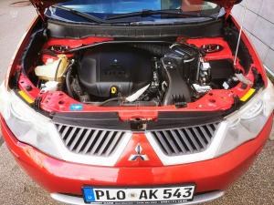 Red Mitsubishi Outlander 2009 in Klaipeda, with an engine capacity of 2.20 L and mileage of 216 thousand km for 4190 €, photo 34 on AUTOMOTO.COM.LV