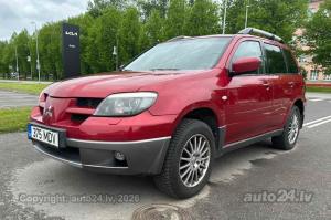 Sarkans Mitsubishi Outlander 2003 Narva, ar dzinēja tilpumu 2.40 L un nobraukumu 290 tūkst. km par 1499 €, foto  vietnē AUTOMOTO.COM.LV