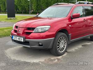 Red Mitsubishi Outlander 2003 in Narva, with an engine capacity of 2.40 L and mileage of 290 thousand km for 1499 €, photo 7 on AUTOMOTO.COM.LV