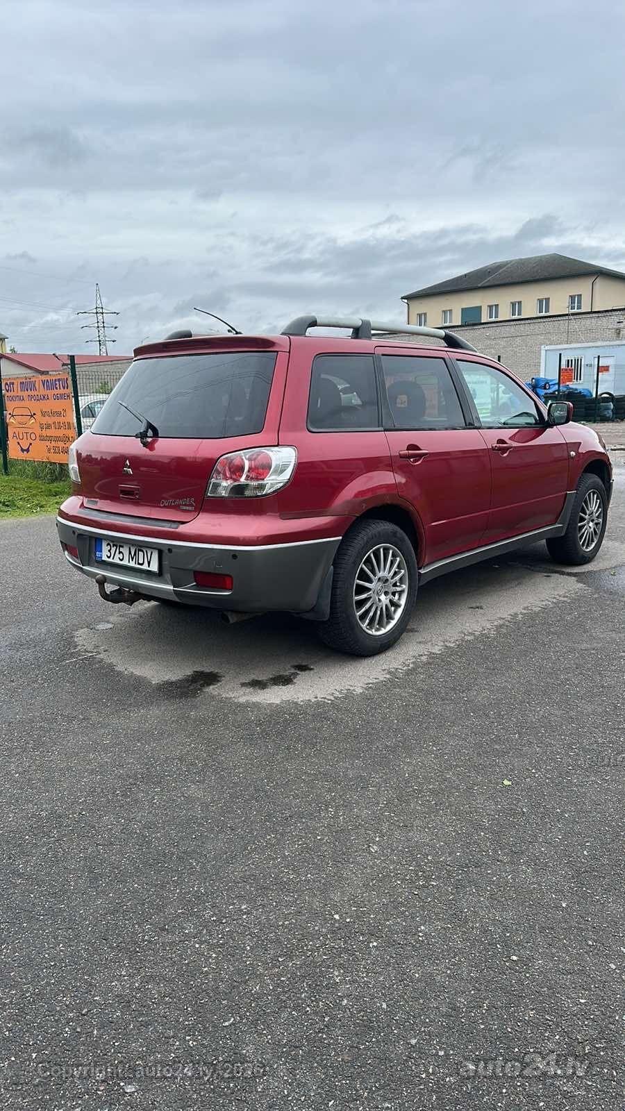 Red Mitsubishi Outlander 2003 in Narva, with an engine capacity of 2.40 L and mileage of 290 thousand km for 1499 €, photo 9 on AUTOMOTO.COM.LV