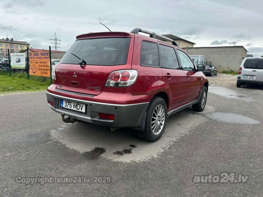 Red Mitsubishi Outlander 2003 in Narva, with an engine capacity of 2.40 L and mileage of 290 thousand km for 1499 €, photo 13 on AUTOMOTO.COM.LV