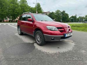 Red Mitsubishi Outlander 2003 in Narva, with an engine capacity of 2.40 L and mileage of 290 thousand km for 1499 €, photo 17 on AUTOMOTO.COM.LV