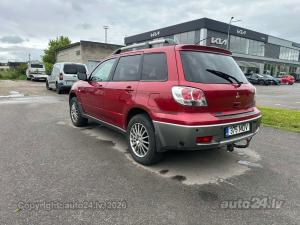 Red Mitsubishi Outlander 2003 in Narva, with an engine capacity of 2.40 L and mileage of 290 thousand km for 1499 €, photo 19 on AUTOMOTO.COM.LV