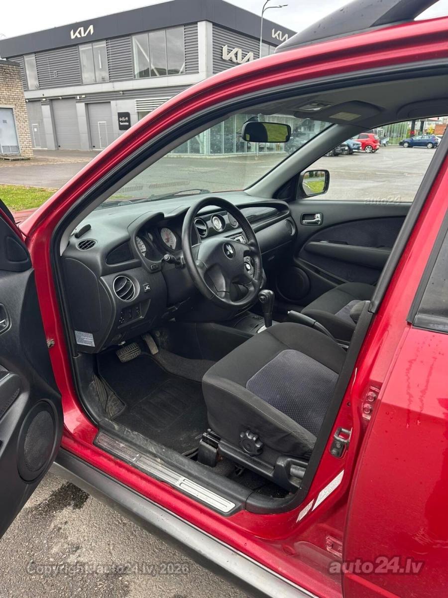 Red Mitsubishi Outlander 2003 in Narva, with an engine capacity of 2.40 L and mileage of 290 thousand km for 1499 €, photo 26 on AUTOMOTO.COM.LV
