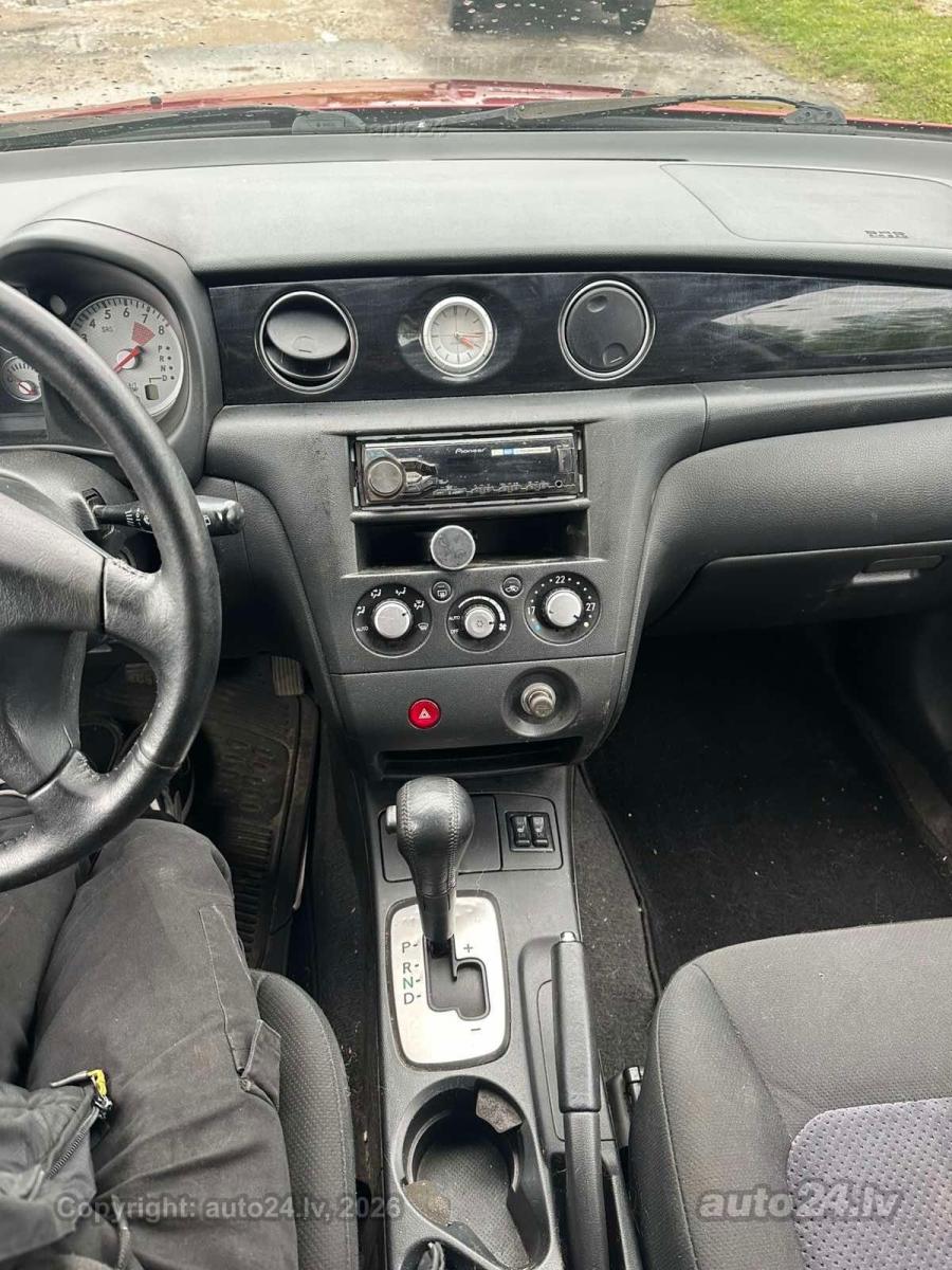 Red Mitsubishi Outlander 2003 in Narva, with an engine capacity of 2.40 L and mileage of 290 thousand km for 1499 €, photo 28 on AUTOMOTO.COM.LV