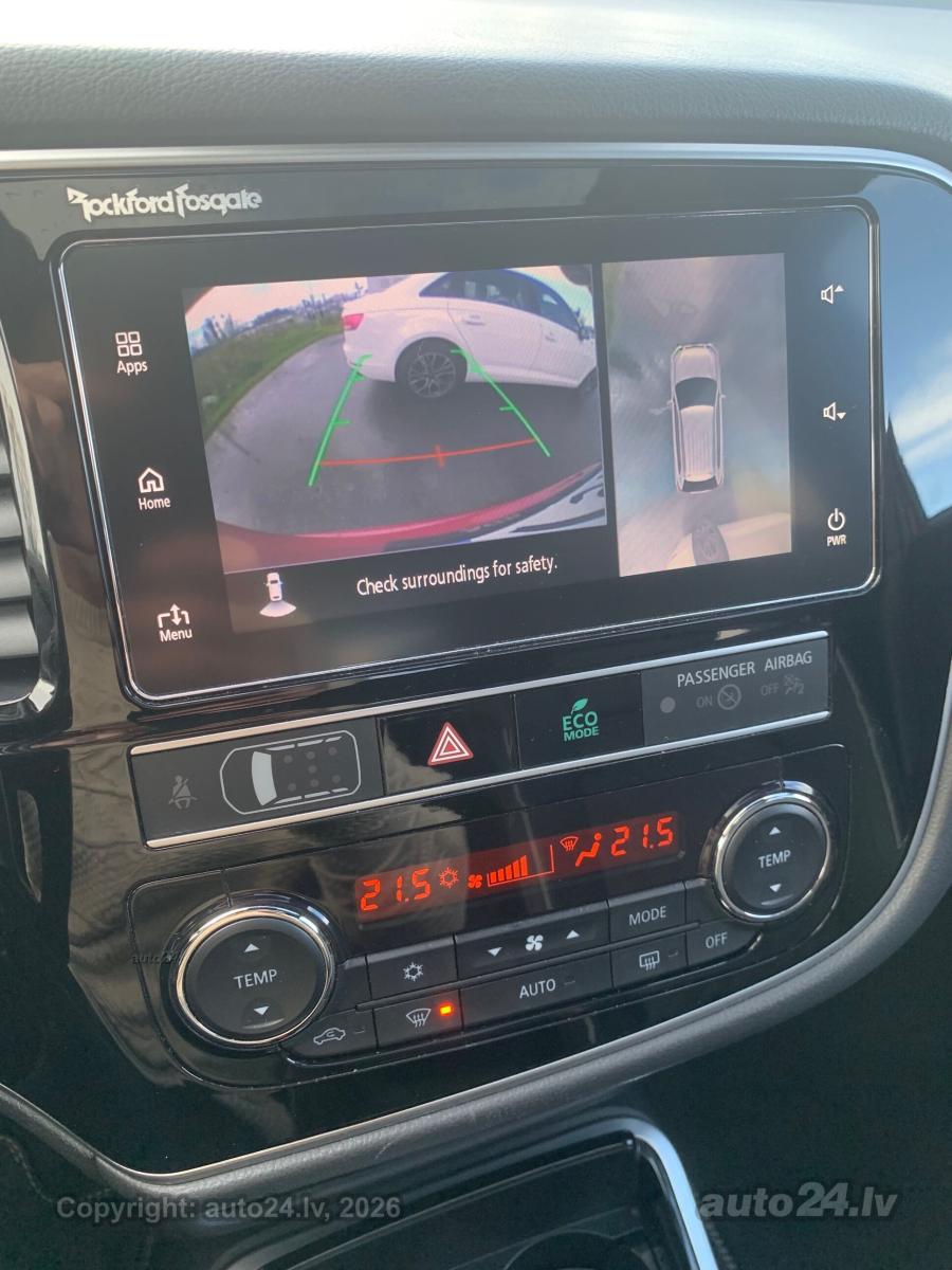 Red Mitsubishi Outlander 2019 in Tallinn, with an engine capacity of 2.40 L and mileage of 106 thousand km for 21490 €, photo 11 on AUTOMOTO.COM.LV