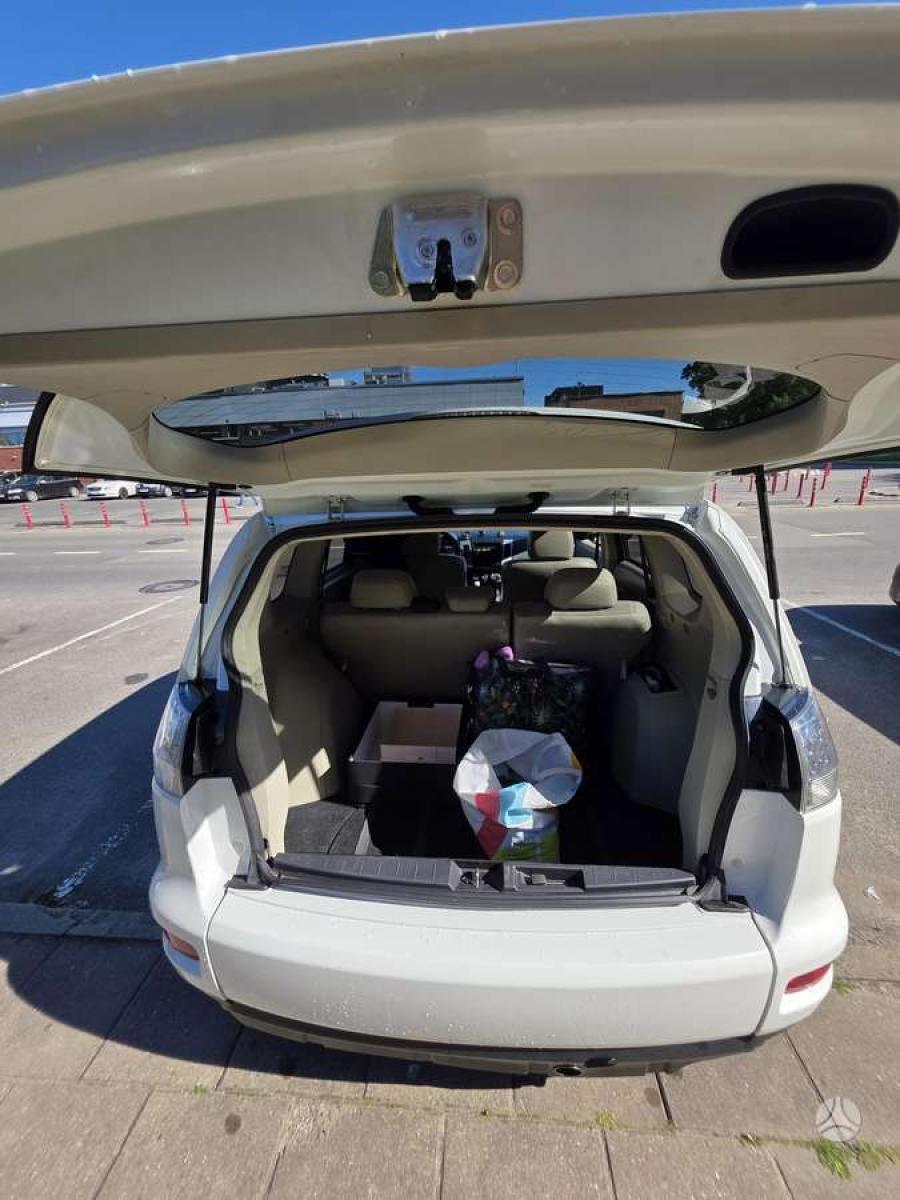 Balts Mitsubishi Outlander 2010 Klaipėda, ar dzinēja tilpumu 2.36 L un nobraukumu 226 tūkst. km par 2400 €, foto 14 vietnē AUTOMOTO.COM.LV