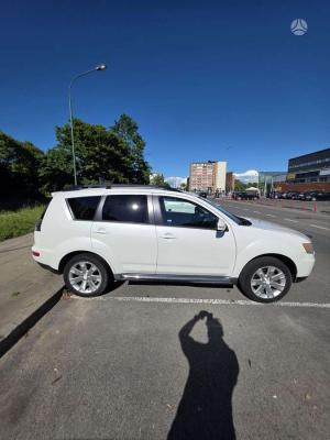 Balts Mitsubishi Outlander 2010 Klaipėda, ar dzinēja tilpumu 2.36 L un nobraukumu 226 tūkst. km par 2400 €, foto 16 vietnē AUTOMOTO.COM.LV