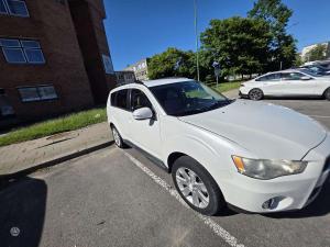 Balts Mitsubishi Outlander 2010 Klaipėda, ar dzinēja tilpumu 2.36 L un nobraukumu 226 tūkst. km par 2400 €, foto 17 vietnē AUTOMOTO.COM.LV
