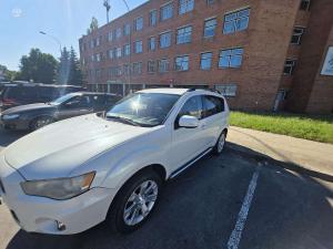 Balts Mitsubishi Outlander 2010 Klaipėda, ar dzinēja tilpumu 2.36 L un nobraukumu 226 tūkst. km par 2400 €, foto 19 vietnē AUTOMOTO.COM.LV