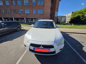 Balts Mitsubishi Outlander 2010 Klaipėda, ar dzinēja tilpumu 2.36 L un nobraukumu 226 tūkst. km par 2400 €, foto 20 vietnē AUTOMOTO.COM.LV